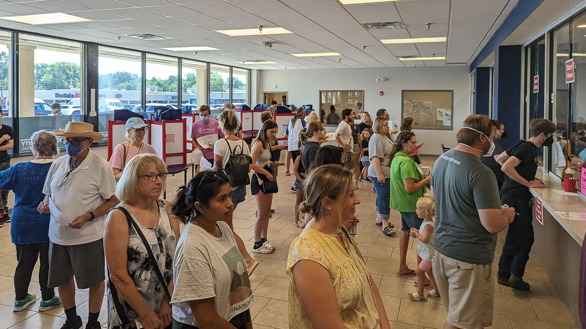Voters line up out the door at Douglas County Elections office ...