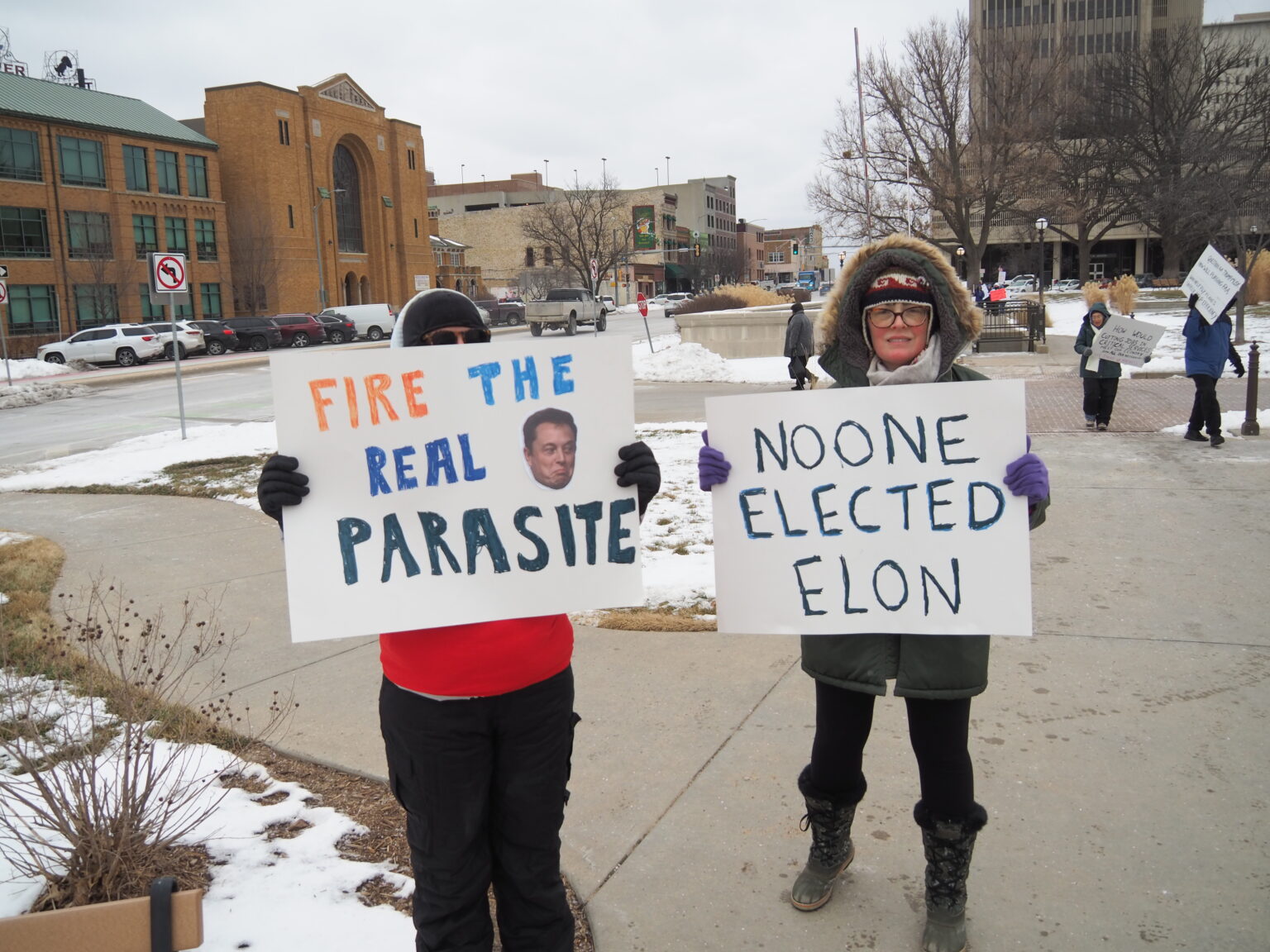 Kansas protest march, Democratic governor sound alarm on federal DOGE ...
