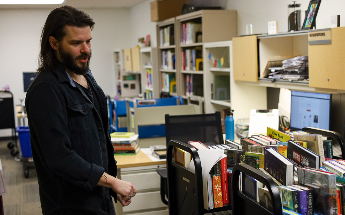 ‘By hook or by crook,’ the Lawrence Public Library’s collections team gets books, materials in ...